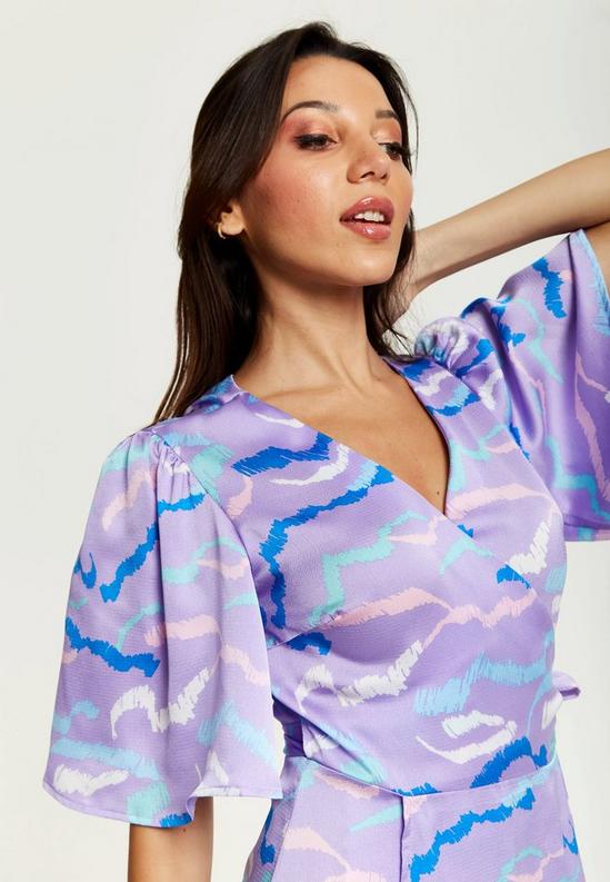 Dresses Mini Abstract Zebra Print Wrap Dress In Lilac Liquorish